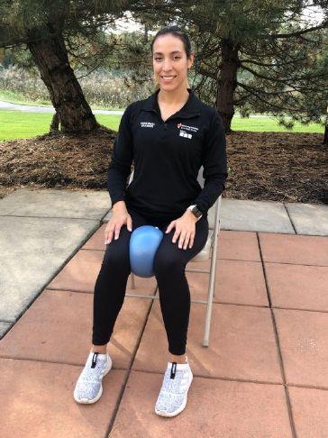 seated ball squeeze exercise