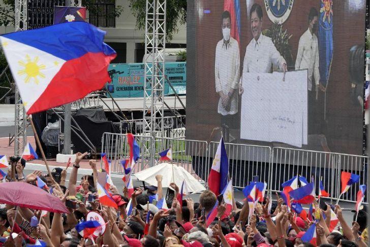 Marcos takes helm in Philippines, silent on father's abuses | Chronicle ...