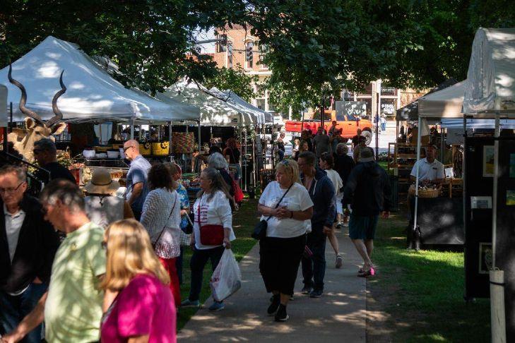 Vendors fill the square as part of the 32nd annual Affair on the Square ...