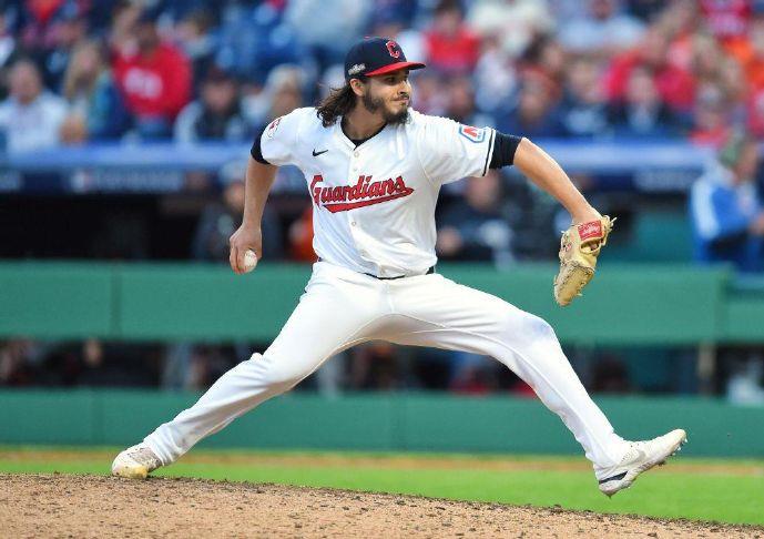 Guardians trade reliever Eli Morgan to Cubs for outfielder Alfonsin ...